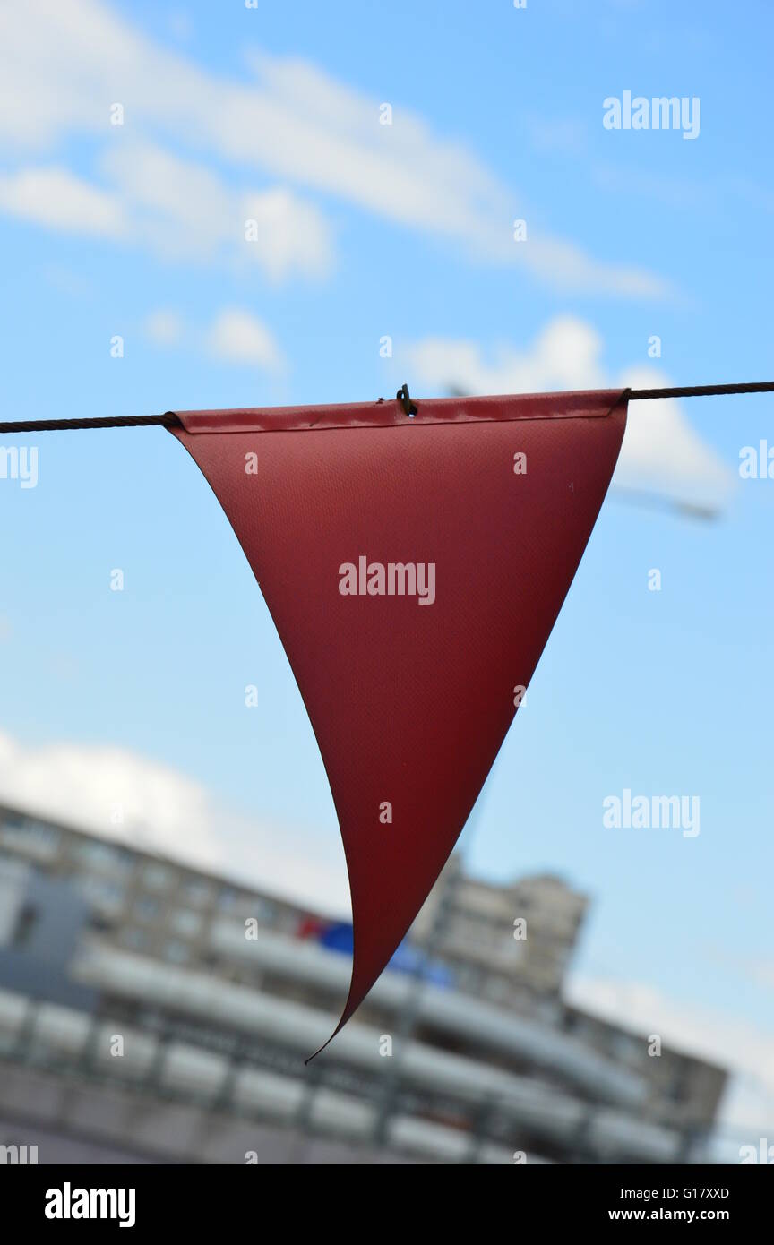 Triangular flags on sunny day Stock Photo - Alamy
