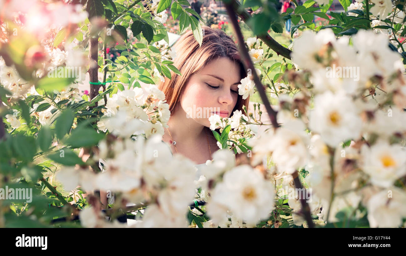 woman in flowers Stock Photo - Alamy