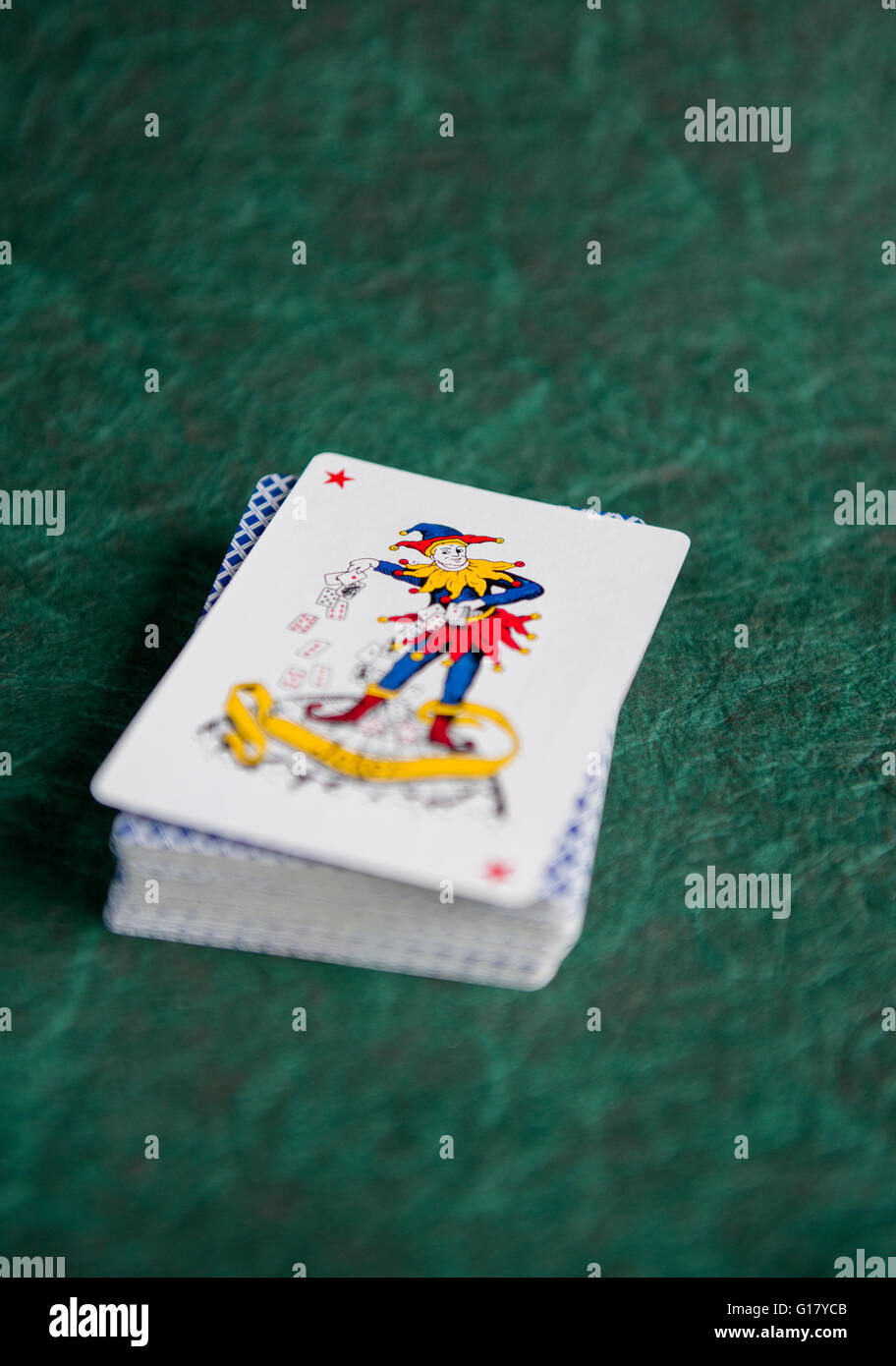 Joker playing cards on green High Resolution Stock Photography and ...