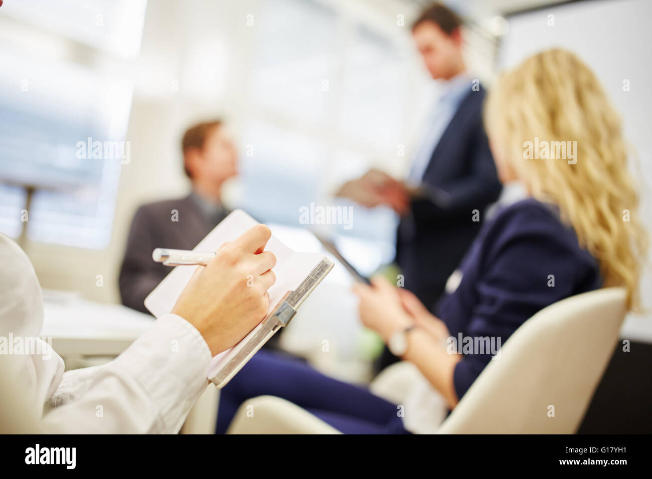 Hand writing a protocol in a negotiation in a business meeting Stock ...