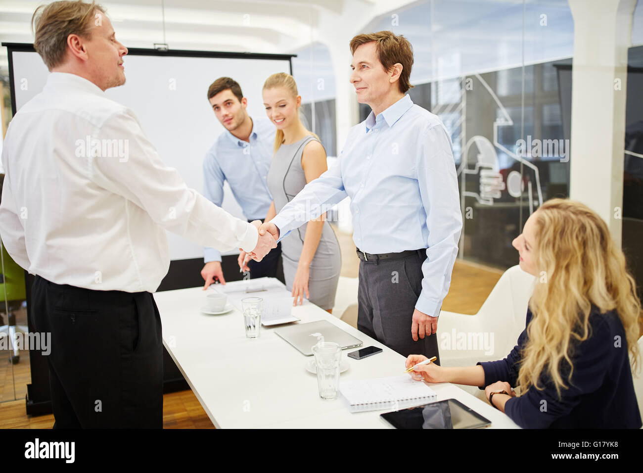 Employer And Employee Shaking Hands