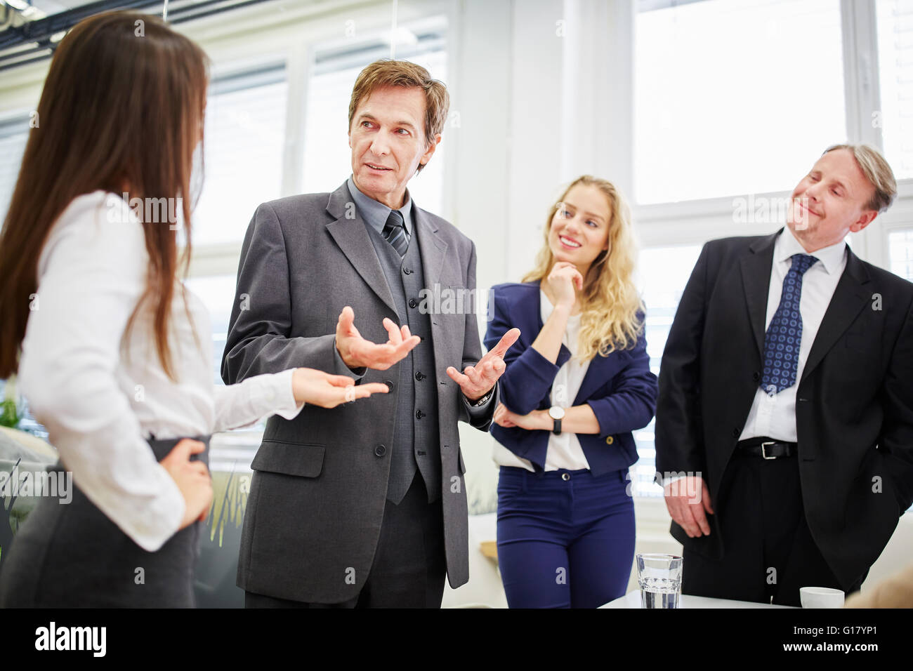 Negotiation meeting between business people in conference room Stock ...
