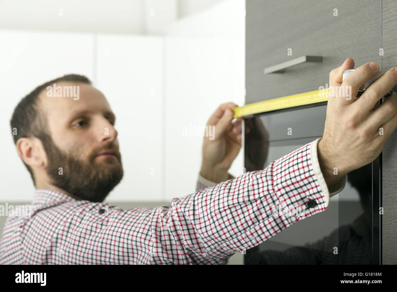 Builder manager measuring in the house, home renovation concepts Stock ...