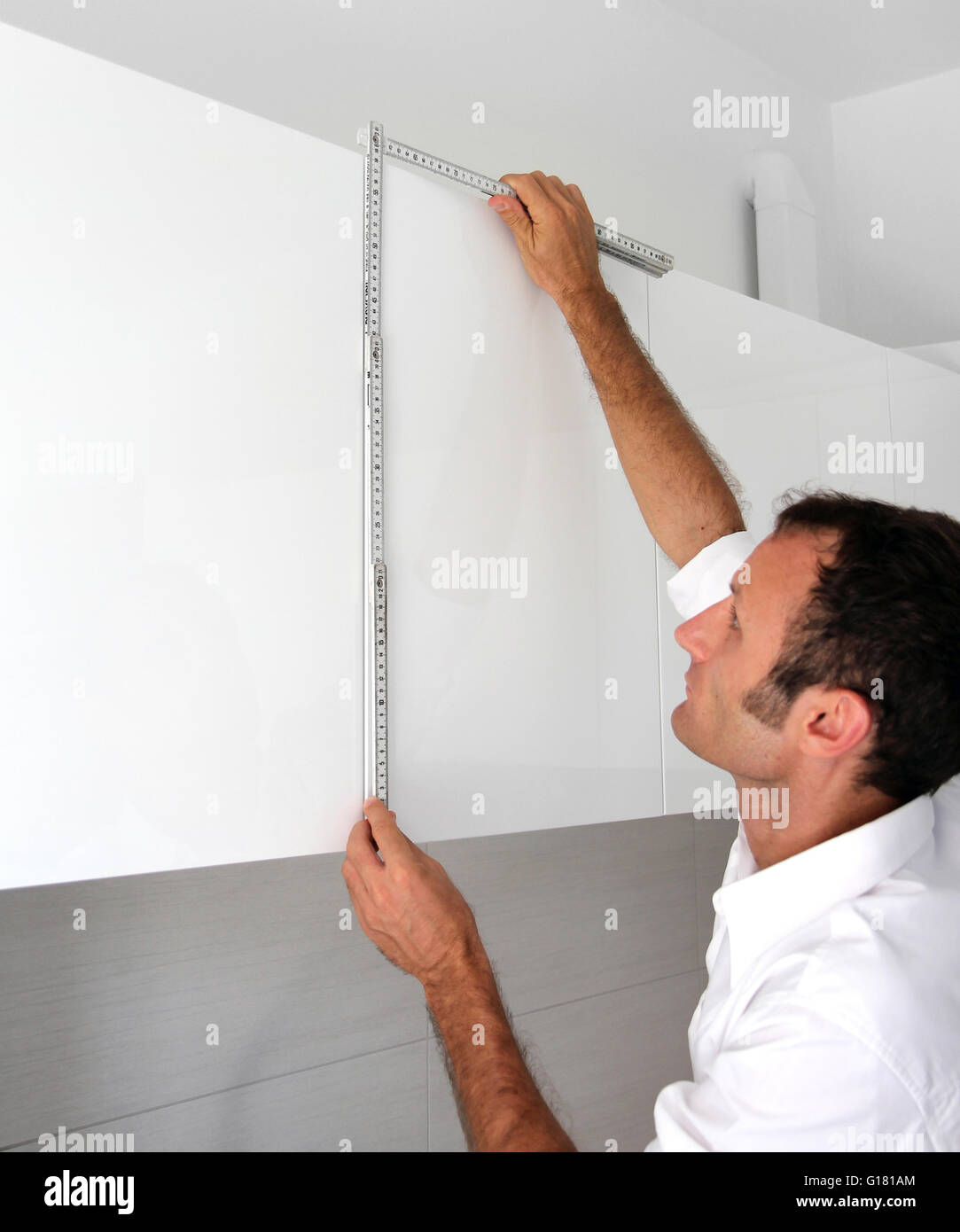 Builder manager measuring in the house, home renovation concepts Stock ...