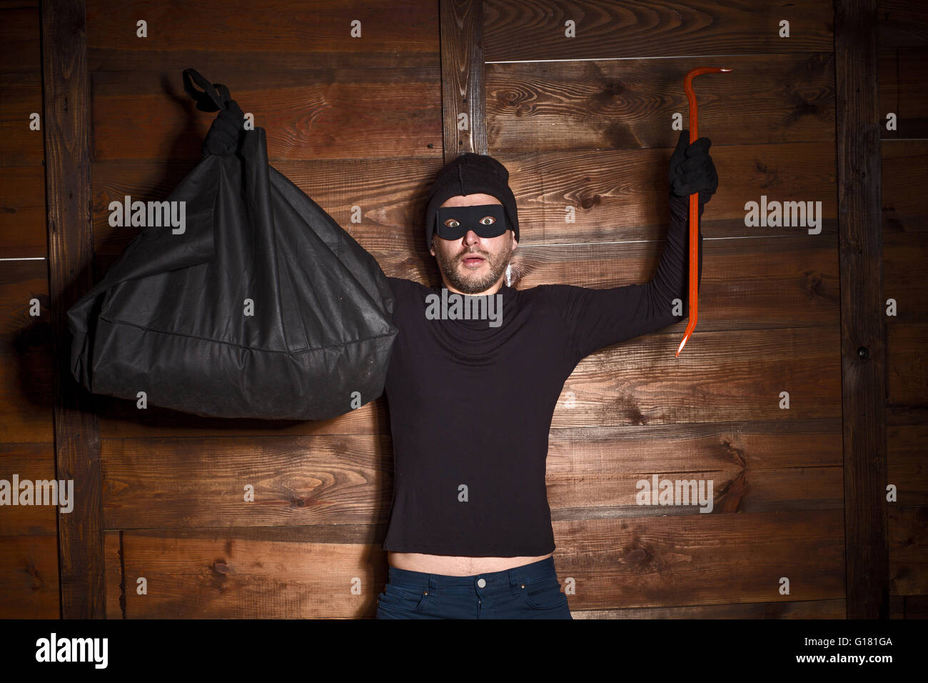 Masked robber hi-res stock photography and images - Alamy