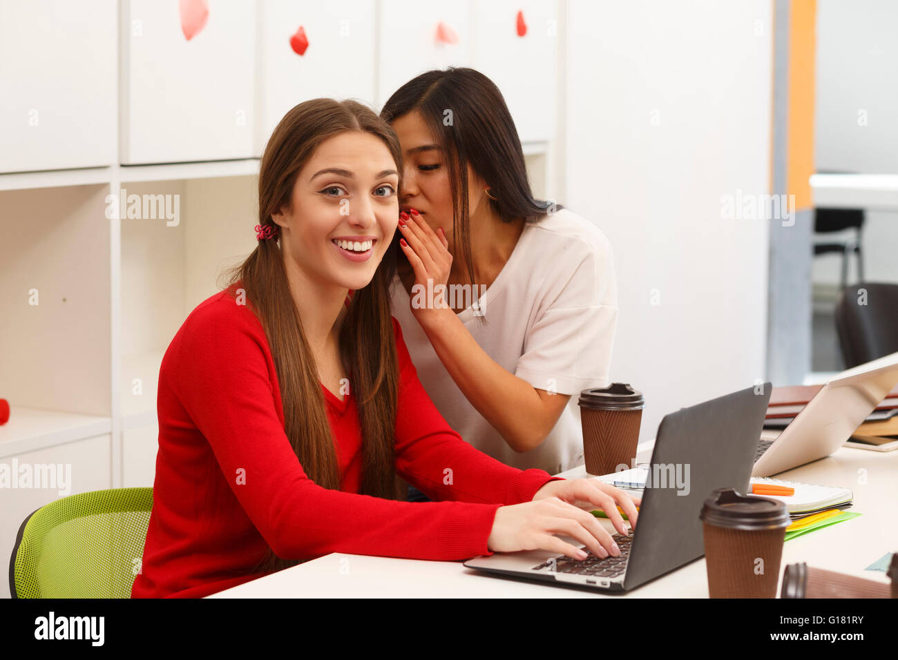 Happy students communicating Stock Photo - Alamy