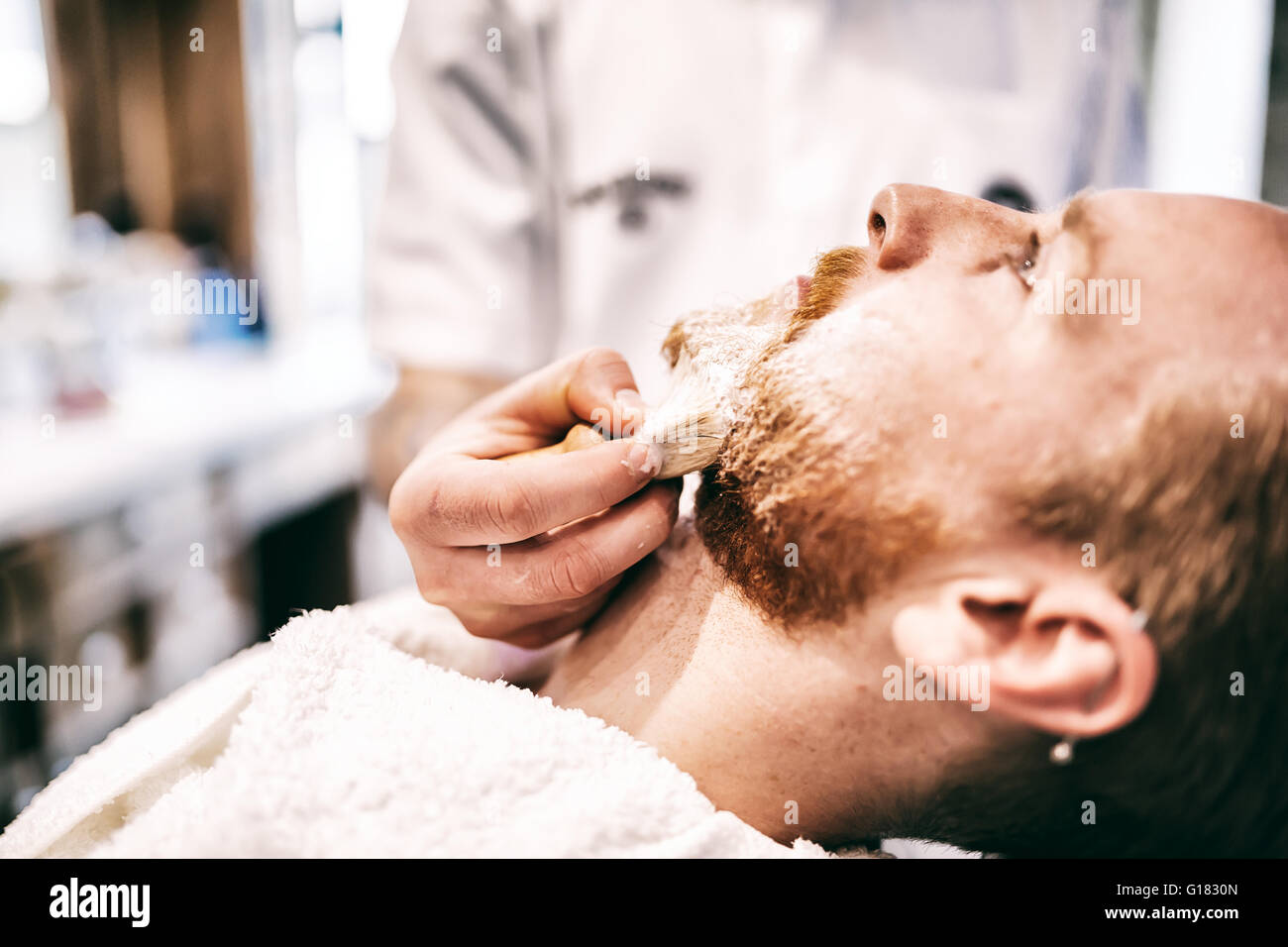 Retro shaving with foam in barber shop Stock Photo - Alamy