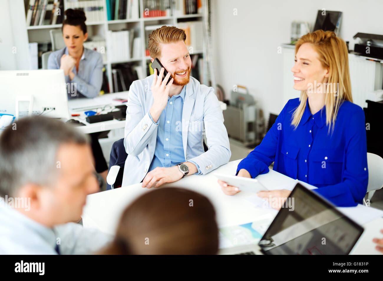 Business people using phones and devices Stock Photo - Alamy