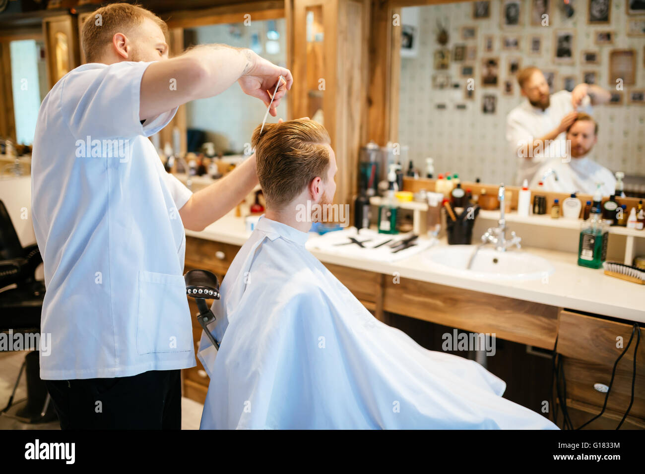 Hair beard and mustache treatment in barber shop Stock Photo - Alamy