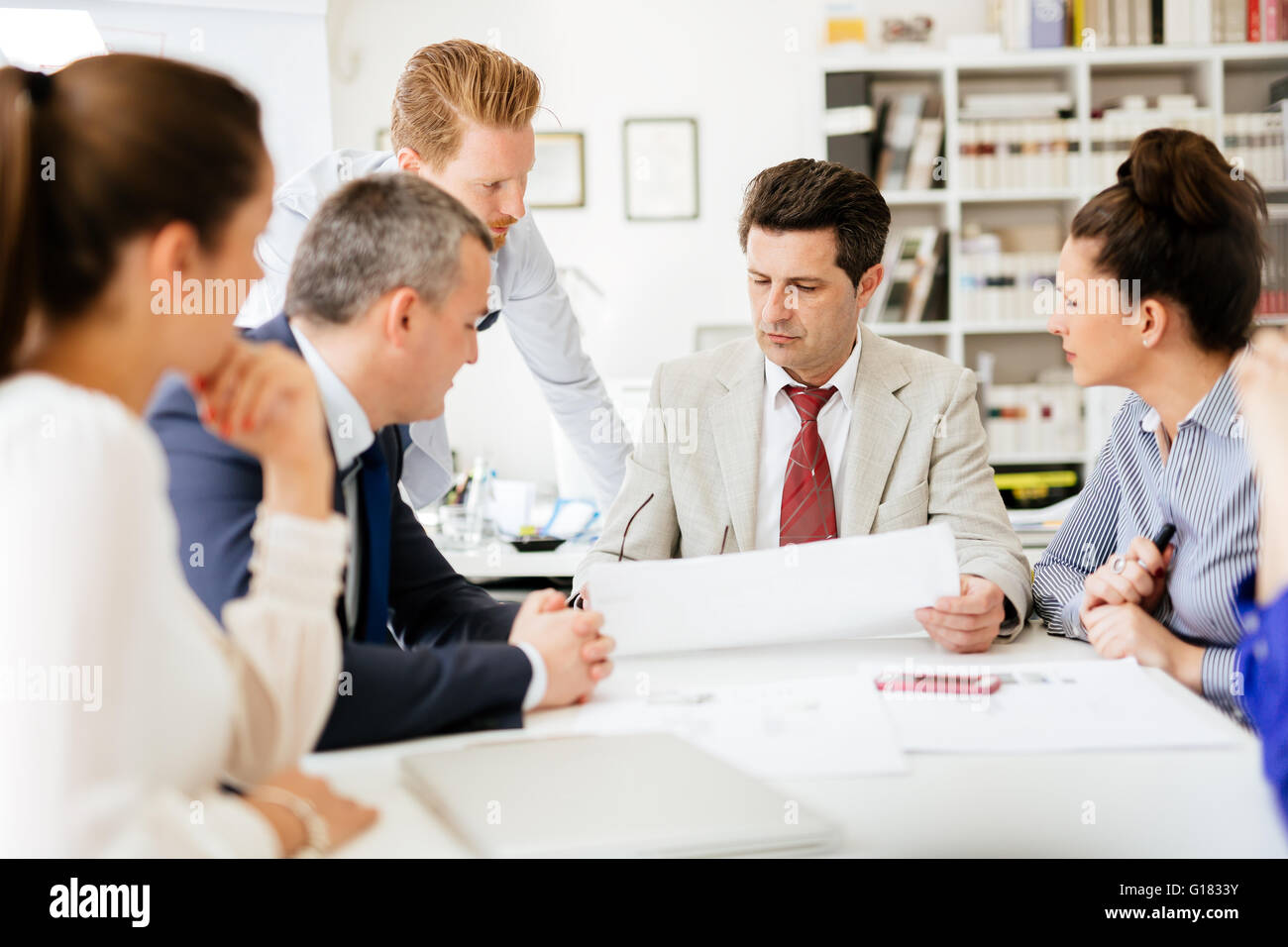 Business people and architects discussing future plans Stock Photo - Alamy