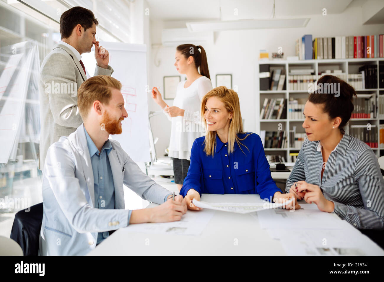 Business people and architects discussing future plans Stock Photo - Alamy