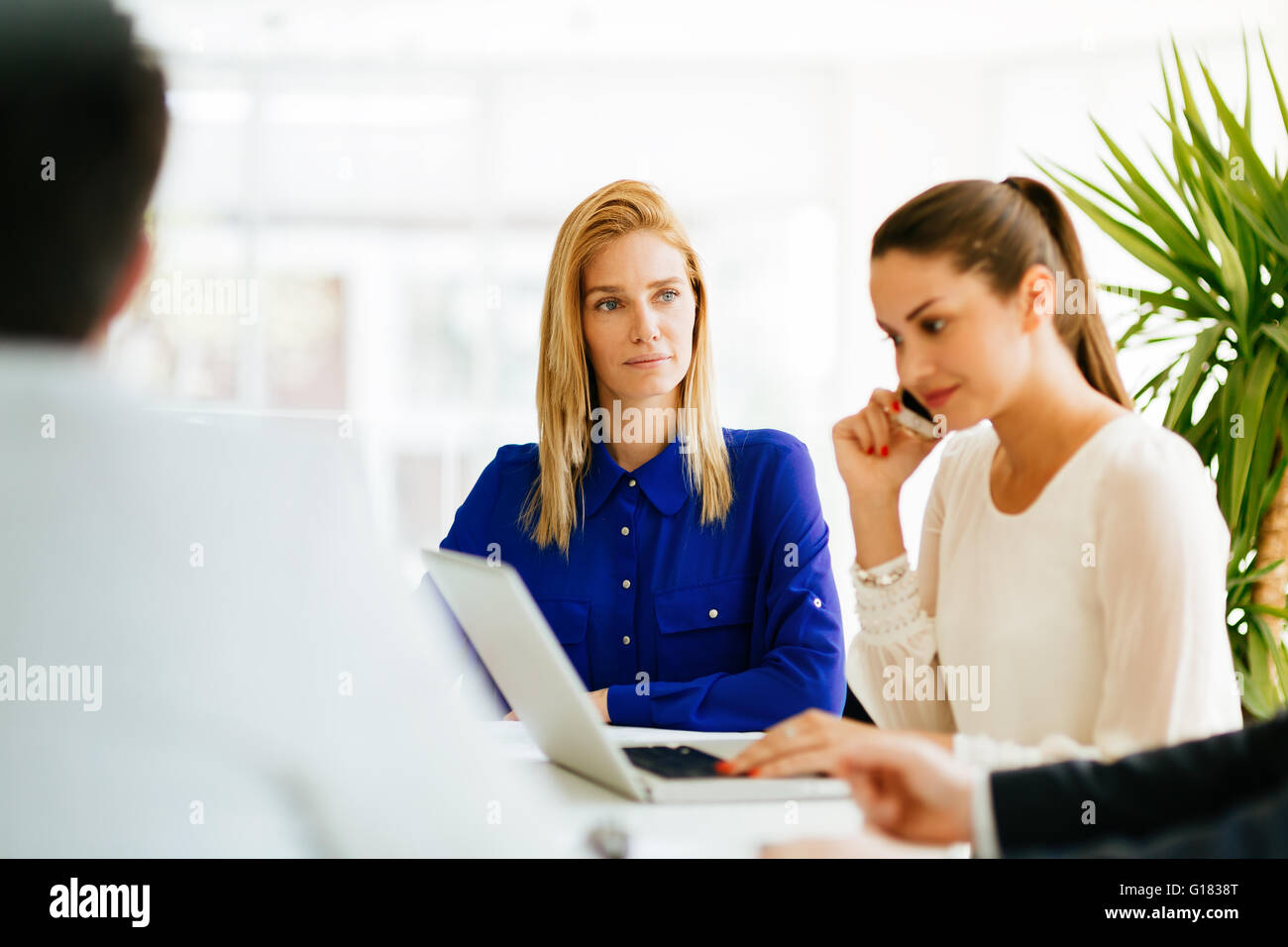 People with phones and computer hi-res stock photography and images - Alamy