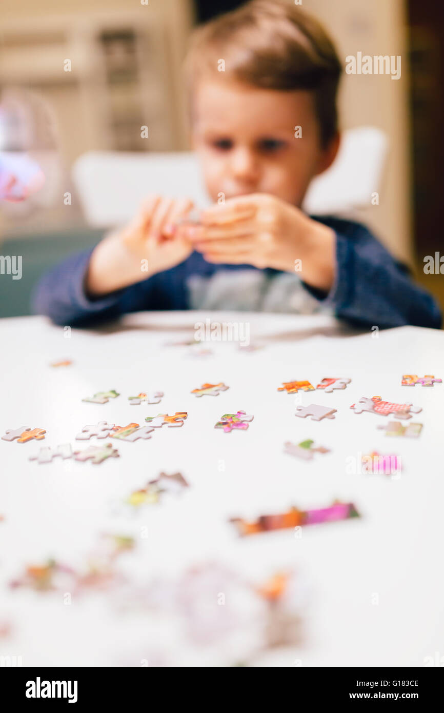 Child concentrating hi-res stock photography and images - Alamy