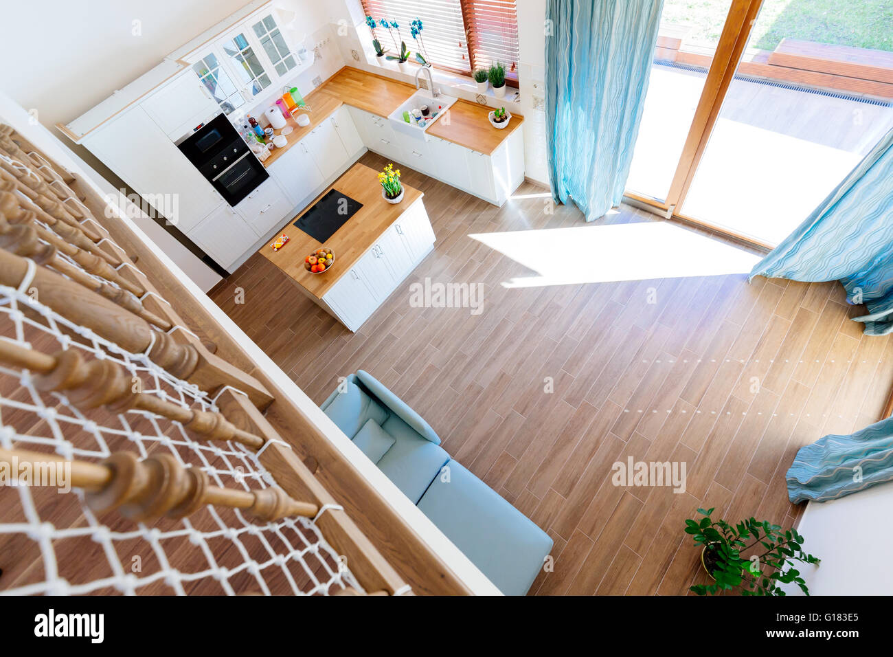 Modern equipped kitchen top view Stock Photo - Alamy