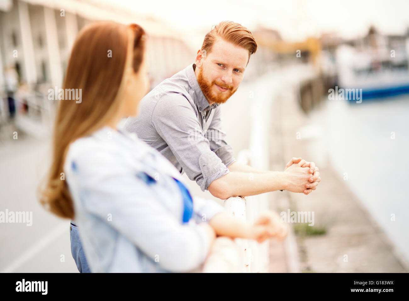 Romantic couple flirting and dating outdoors Stock Photo - Alamy