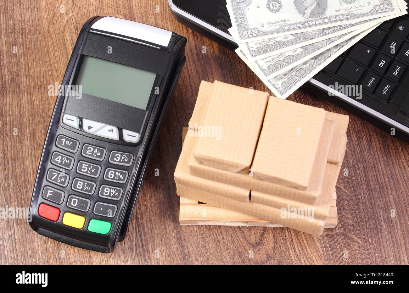 Credit card reader, payment terminal with currencies dollar, laptop and ...