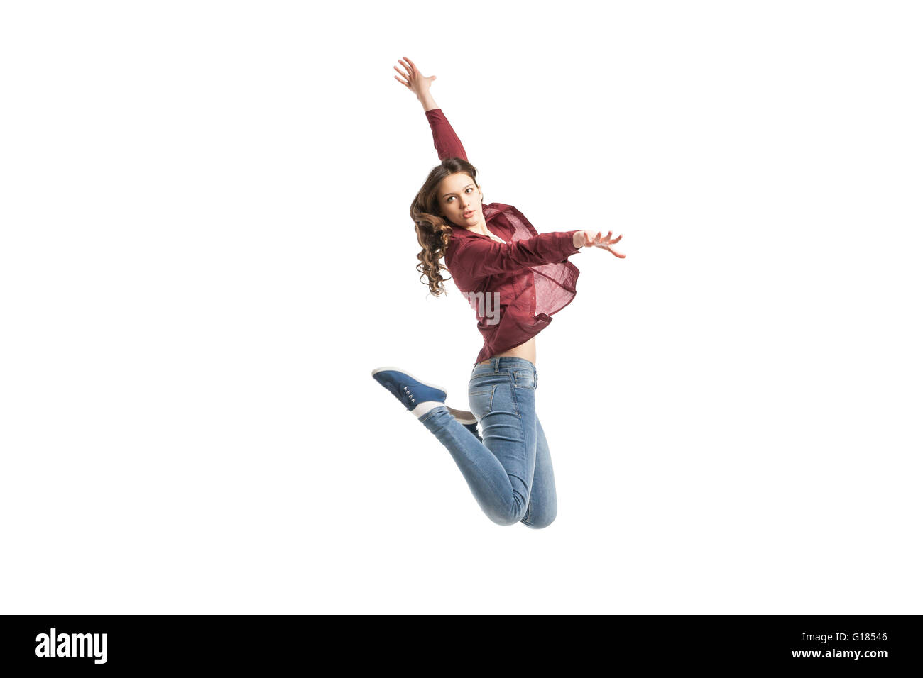 Young girl dancing over white background Stock Photo - Alamy
