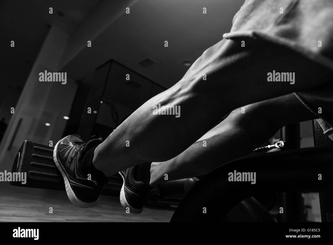 Bodybuilder Doing Heavy Weight Exercise For Legs Stock Photo - Alamy
