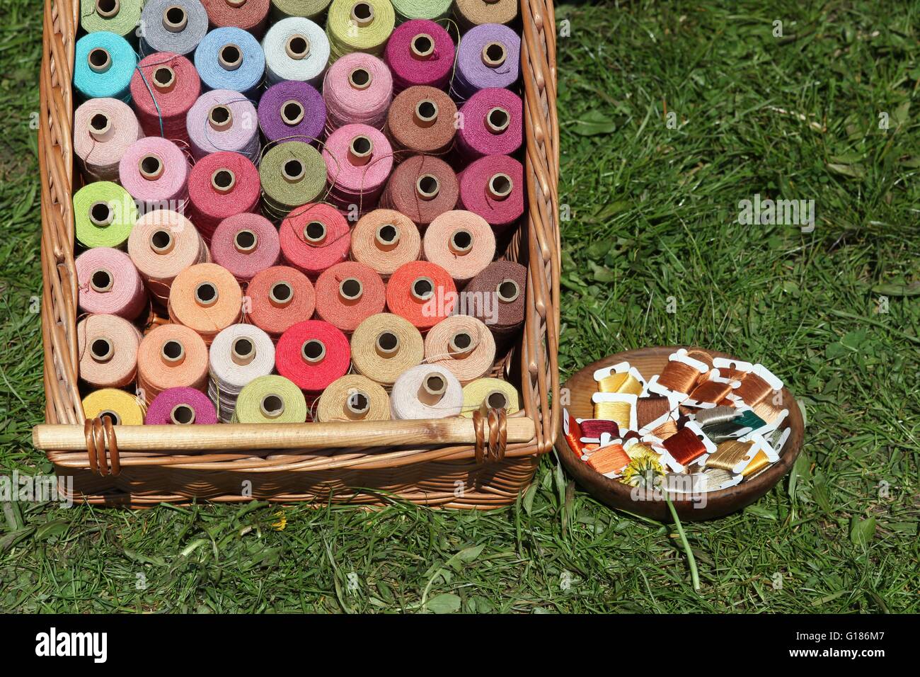 Colorful spools of thread for sewing Stock Photo - Alamy