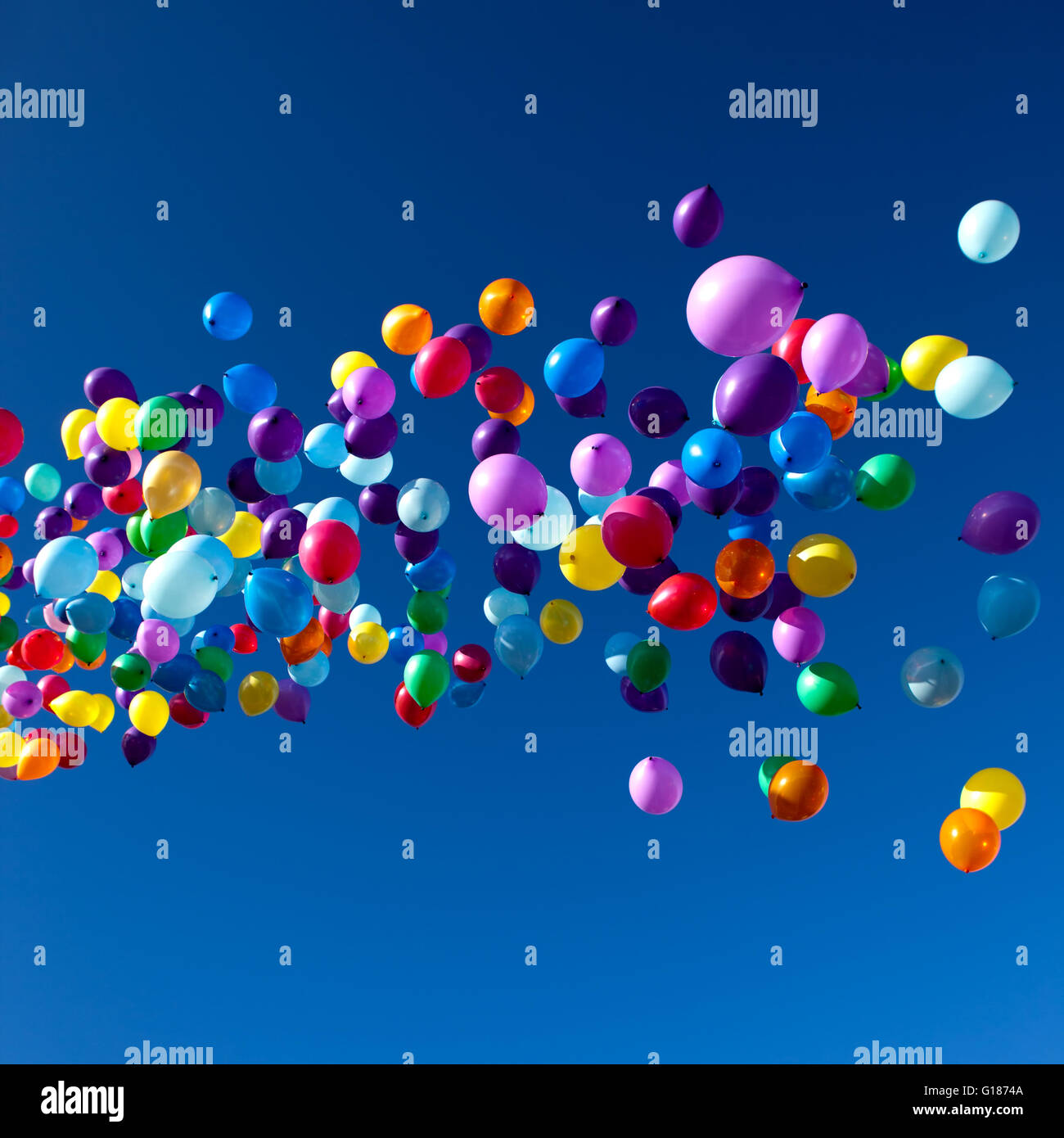 Colorful Balloons flying in the sky party Stock Photo - Alamy