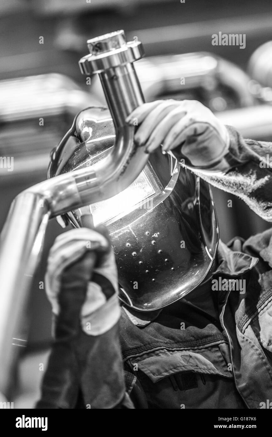 Industrial welder welding in construction Black and White Stock Photos ...