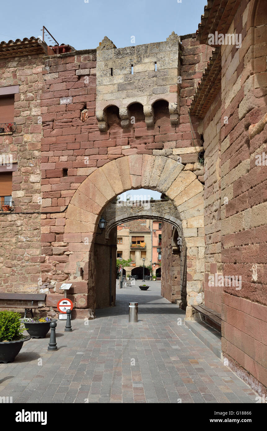 The ancient gate in the Spanish red town Prades Stock Photo - Alamy