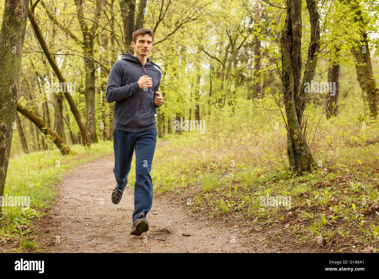 Young sporty man runner hi-res stock photography and images - Alamy
