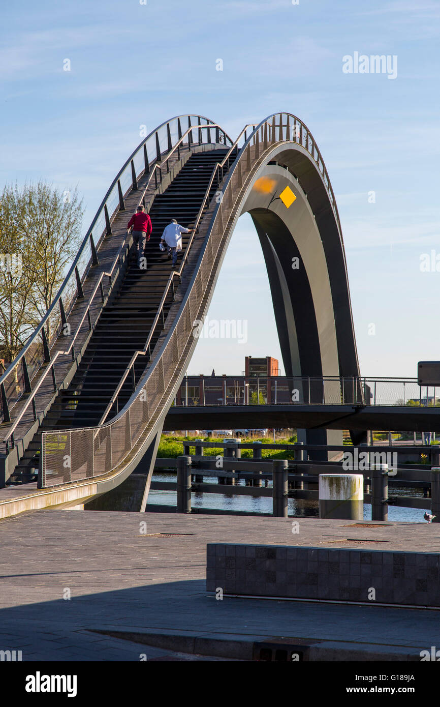 Cycle and pedestrian bridge, Melkwegbruk in Purmerend, North Holland ...