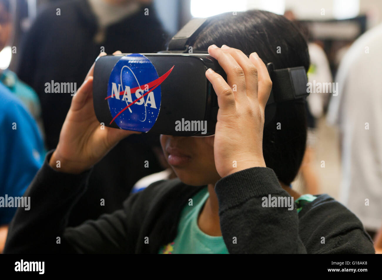 Child using 3D goggles at science fair NASA booth - USA Stock Photo - Alamy