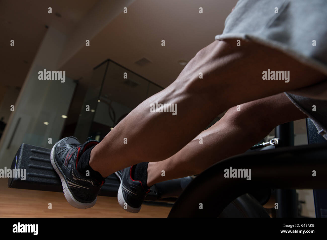 Bodybuilder Doing Heavy Weight Exercise For Legs Stock Photo - Alamy