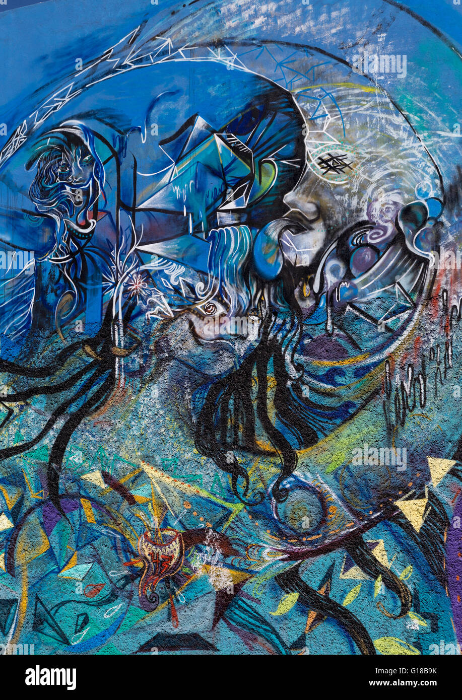 Urban art depicting several abstract characters in the Spanish colonial ...