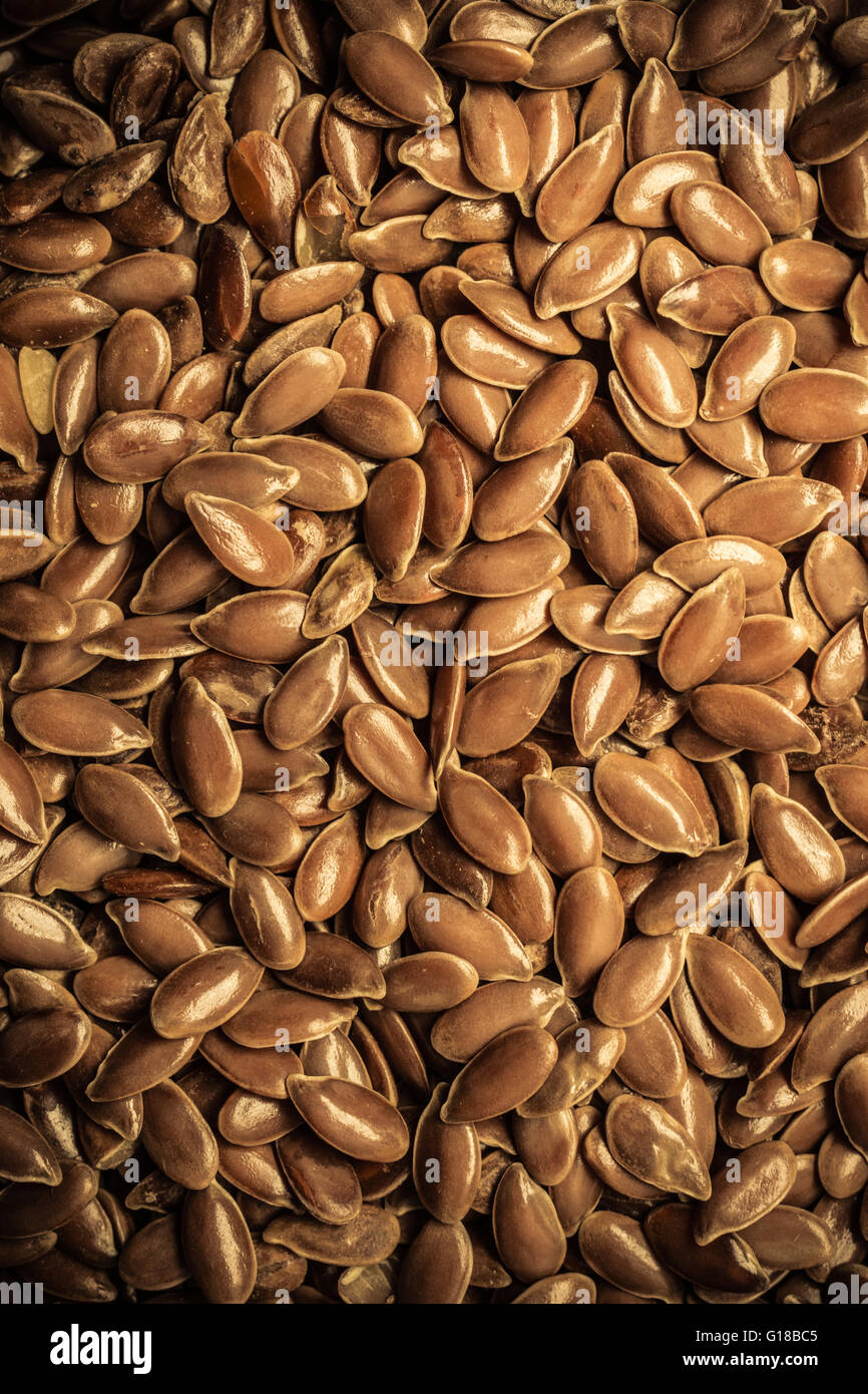 Healthy diet organic nutrition. Brown raw flax seeds linseed as texture background Stock Photo ...