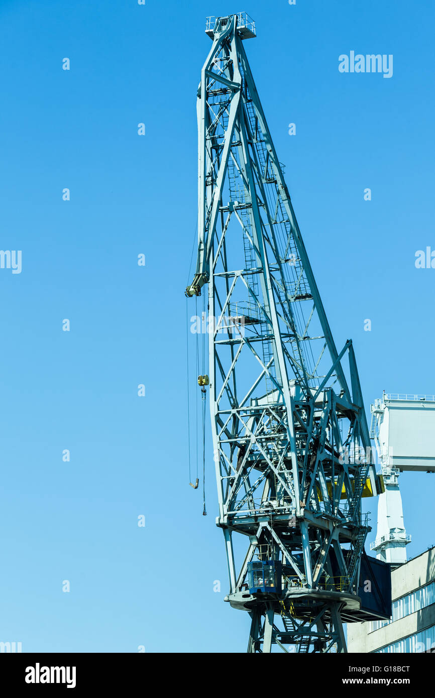 Business and commerce. Heavy load dockside cranes in port, cargo ...