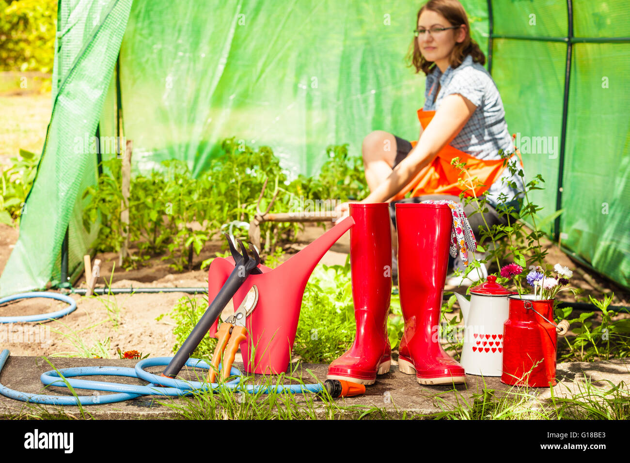 Gardening red boot equipment hi-res stock photography and images - Alamy