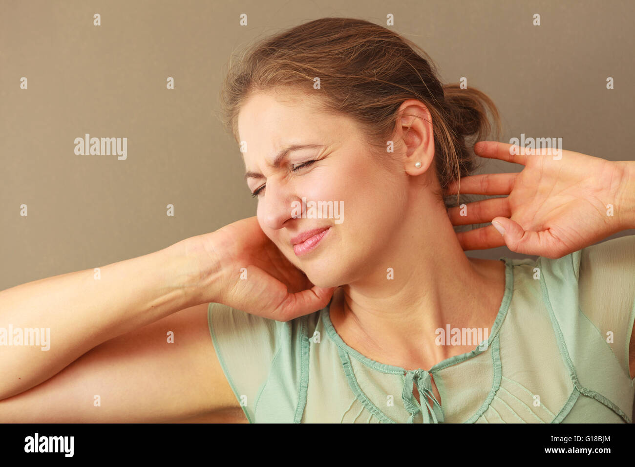 Aches and pains concept. Woman having bad ache and pain. Female placing ...