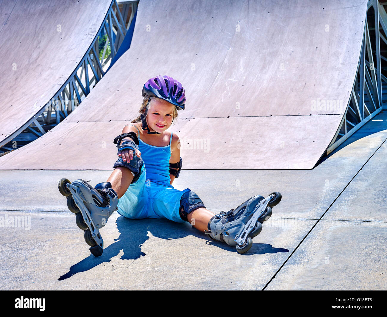 Girl riding on roller skates Stock Photo - Alamy