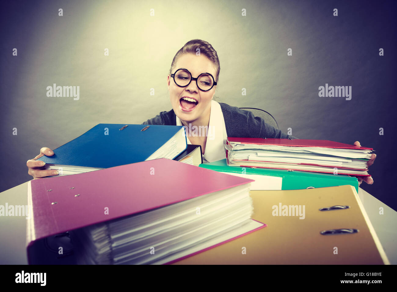 Happiness and satisfaction from working. Young positive happy blonde ...