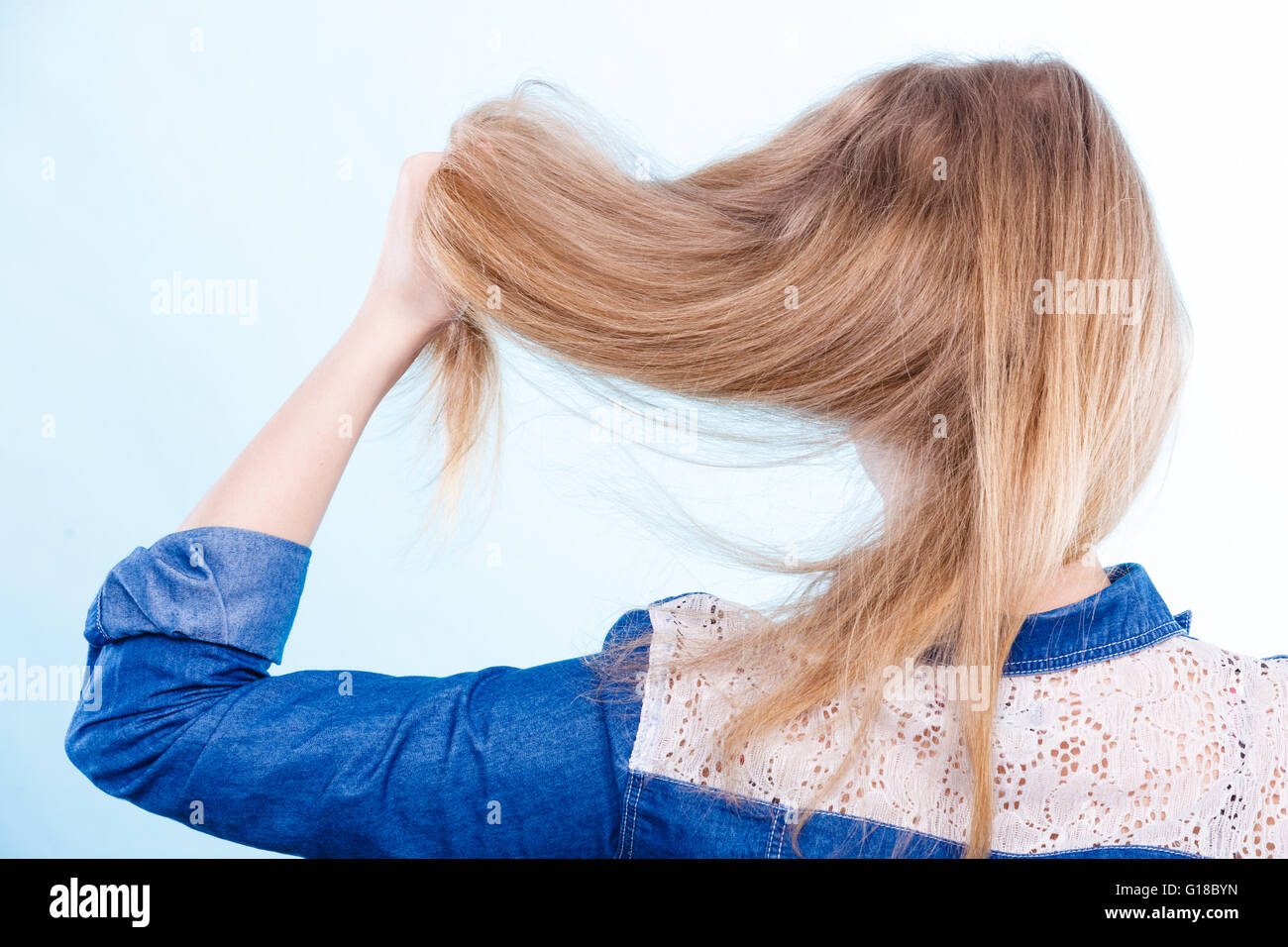 Hairstyle and hairdo. Haircare concept. Back view of blonde woman ...