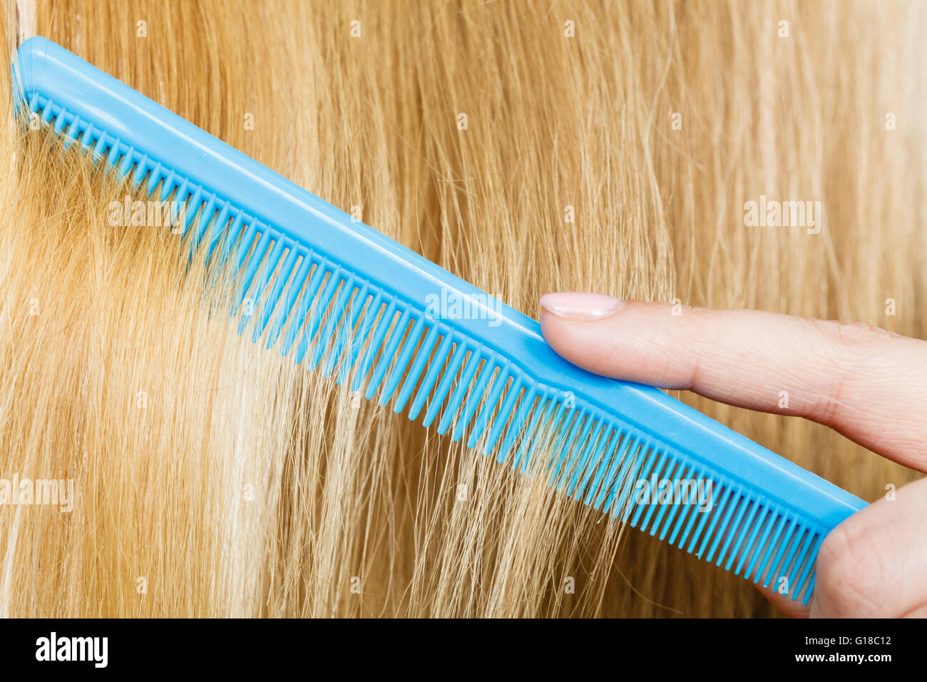 Combing and brushing concept. Routine everyday hygiene. Close up of ...