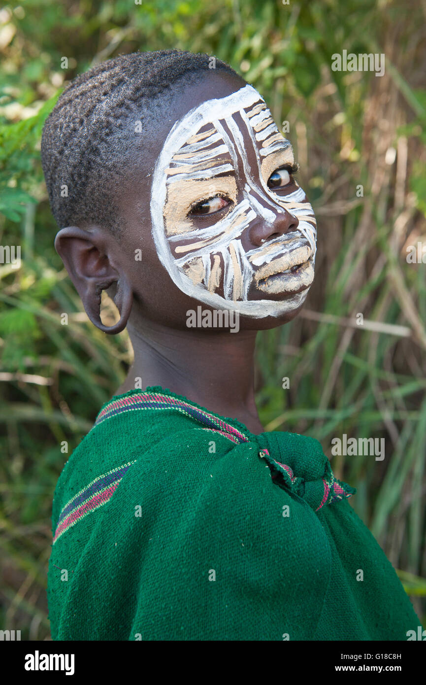 Surma girl with body paintings and distorted ears, Kibish, Omo River ...