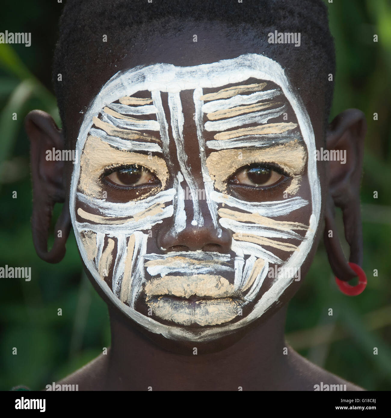 Surma girl with body paintings and distorted ears, Kibish, Omo River ...