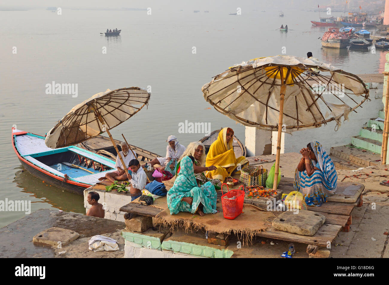 The holy river ghats of Varanasi, full with their colorful religious ...