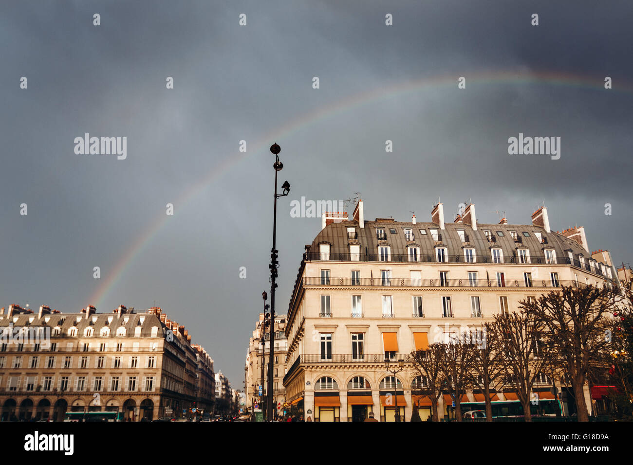 Paris Street View with Rainbow in the Sky After Rain. Traditional ...