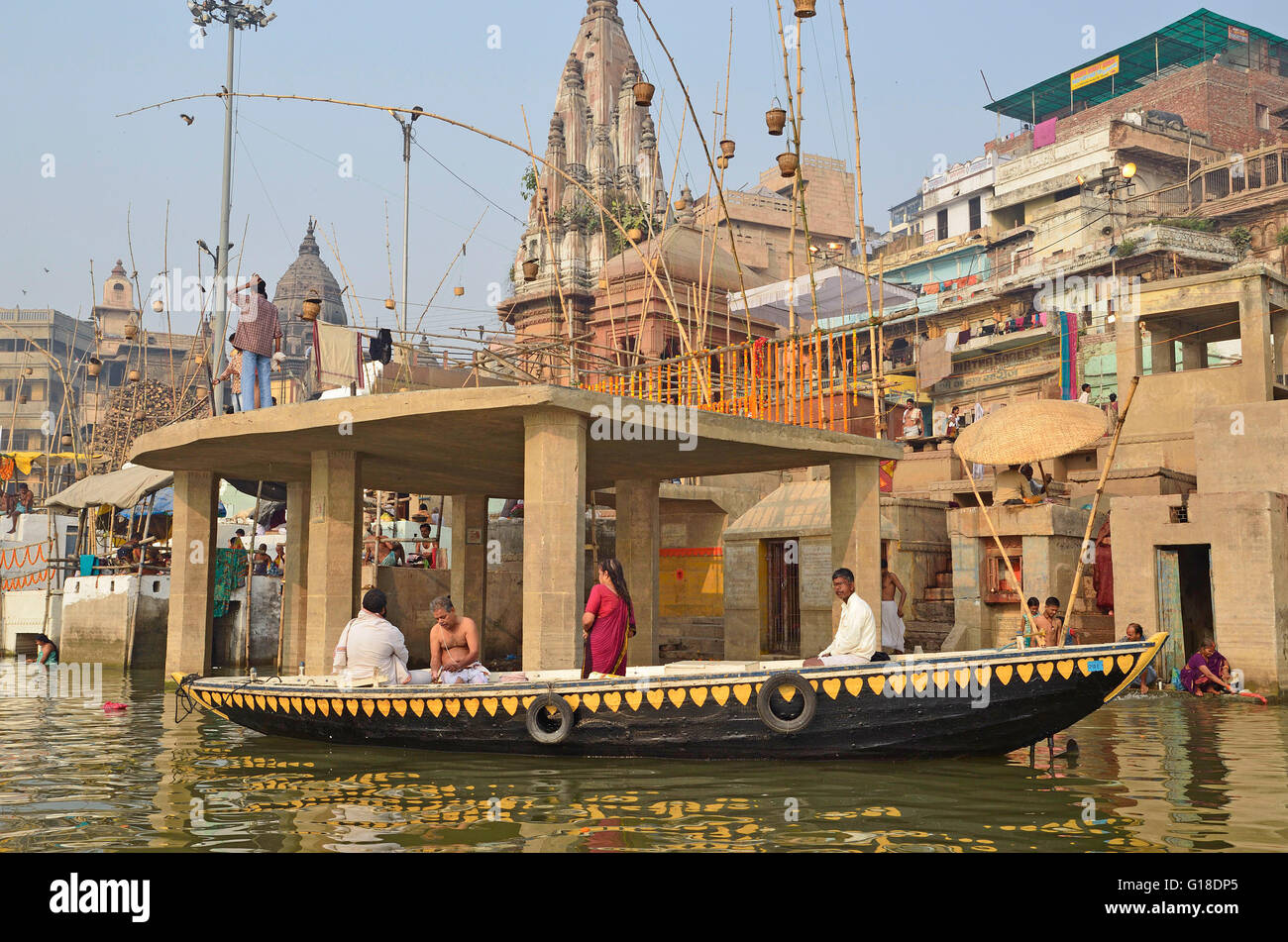 The holy river ghats of Varanasi, full with their colorful religious ...