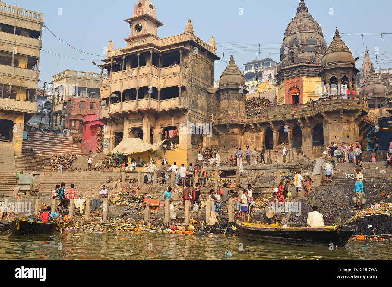 Manikarnika Ghat, the holy cremation ground for the Hindus, on the bank ...