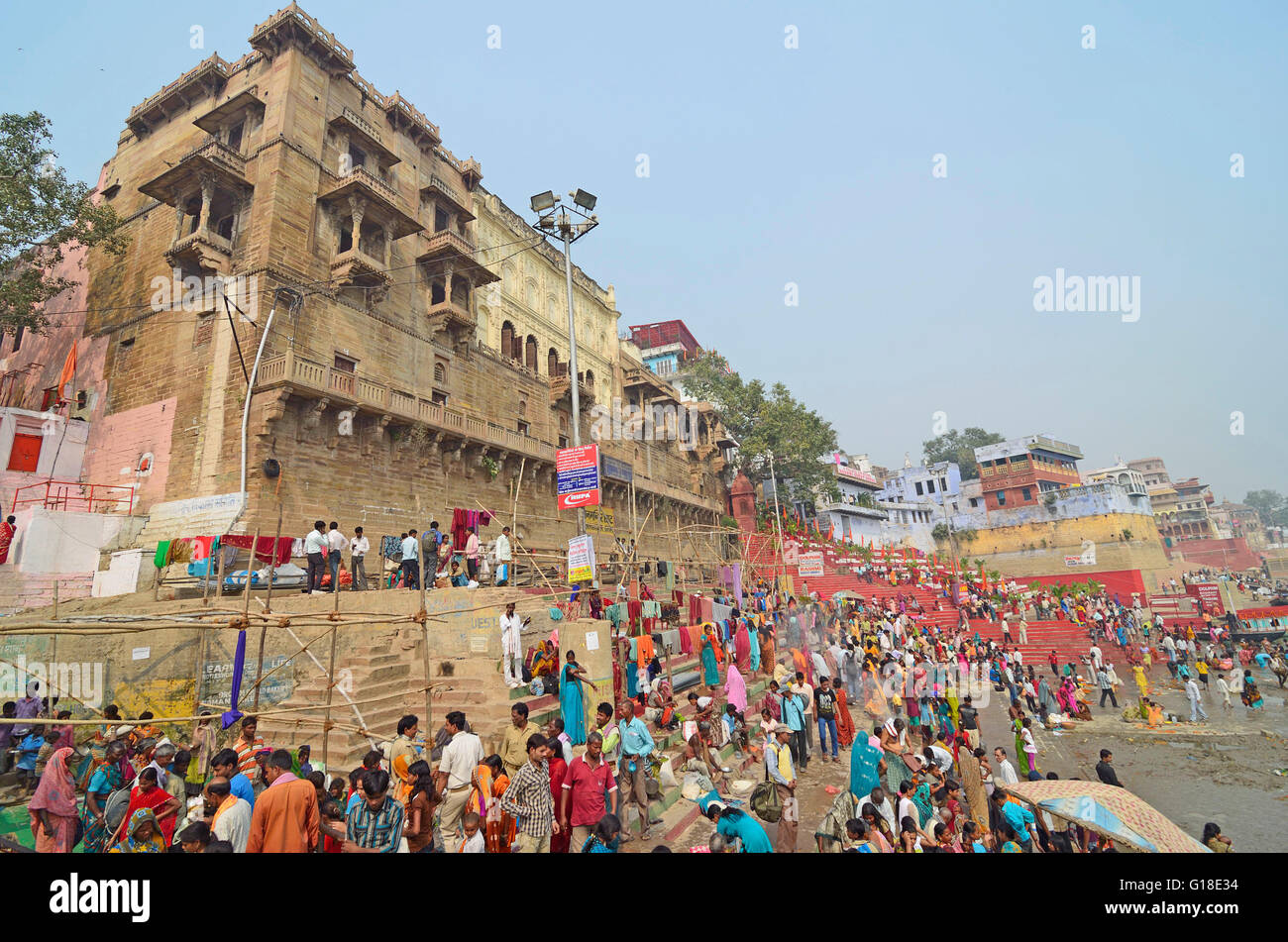 The holy river ghats of Varanasi, full with their colorful religious ...