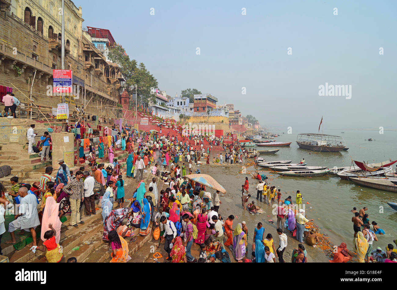 The holy river ghats of Varanasi, full with their colorful religious ...