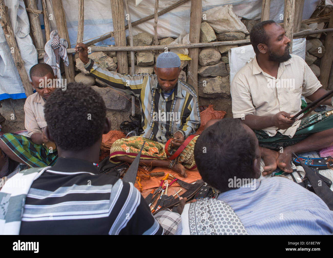 Afar tribe men making traditional knife called guile, Oromo, Sambate ...