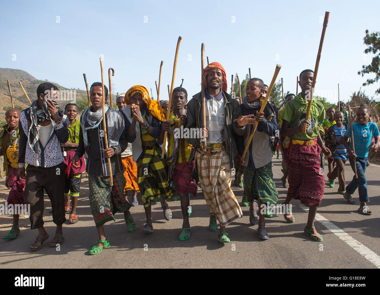 Oromo men with canes dancing during a wedding celebration, Oromo ...