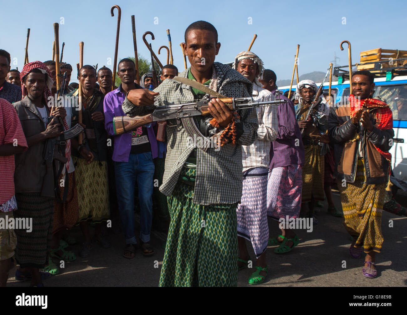 Oromo man with a kalashnikov during a wedding celebration, Oromo ...